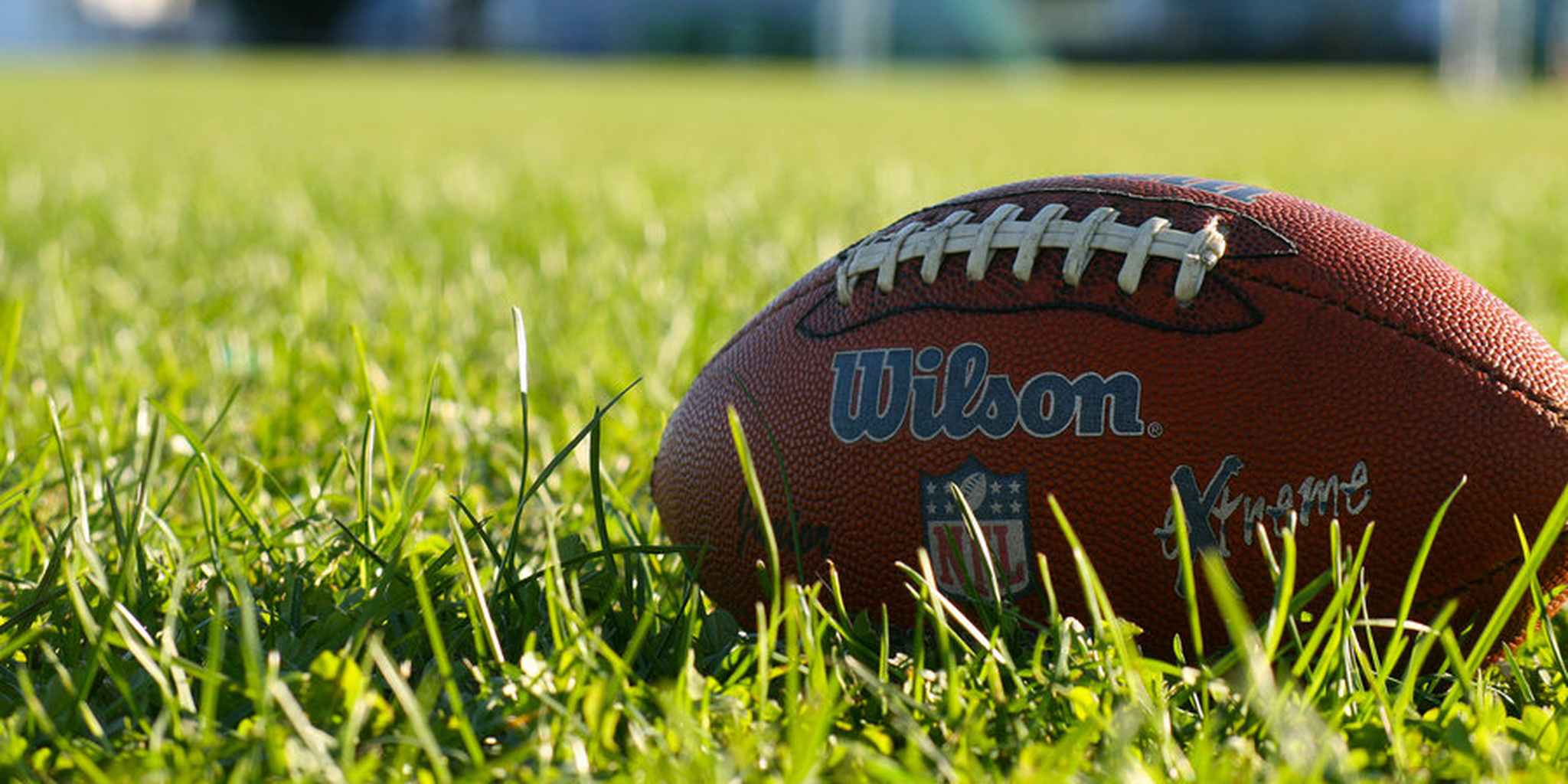 Football player vomits on ball, snaps to quarterback