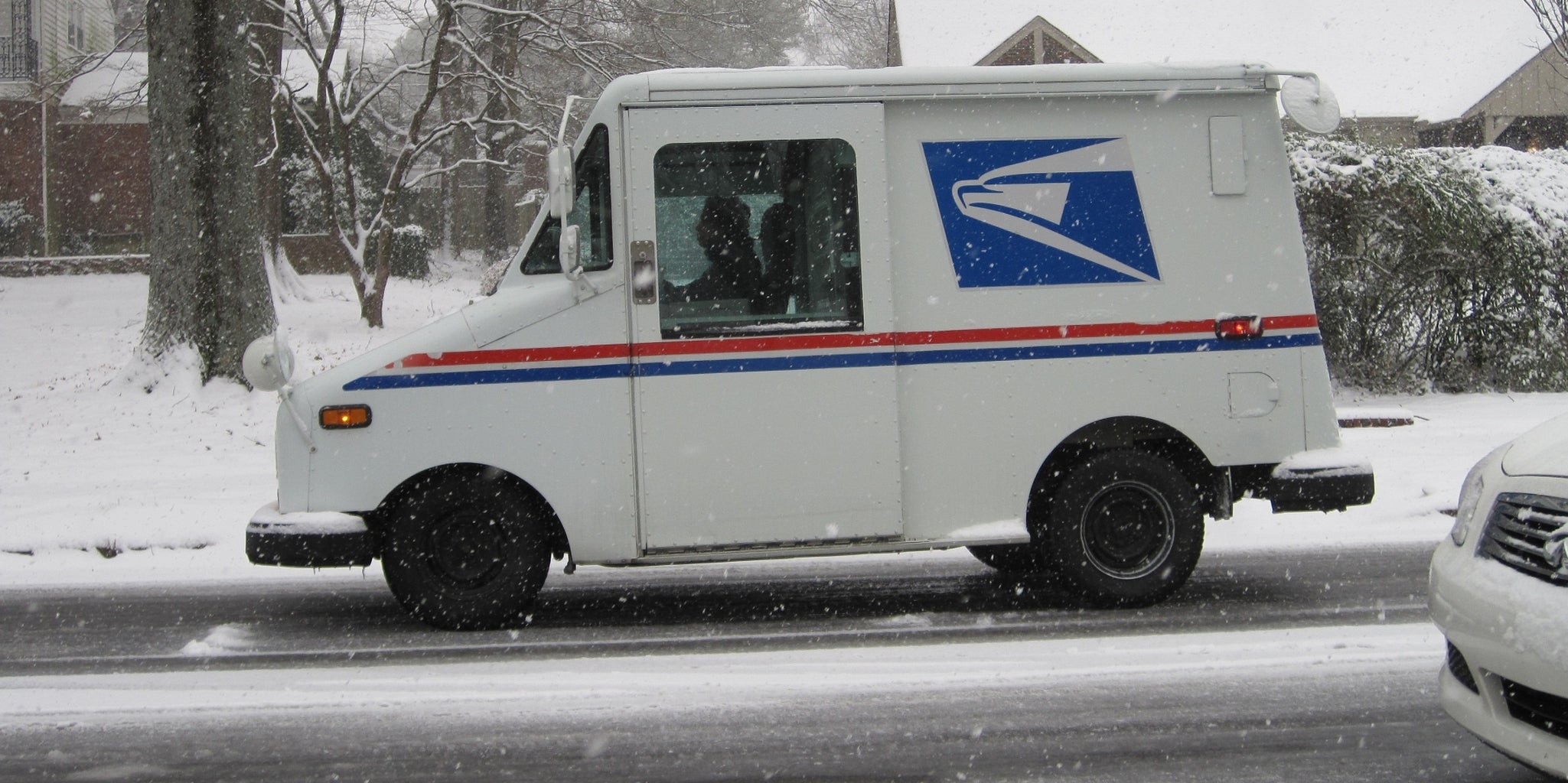 Surveillance footage catches USPS carrier throwing package, dancing ...