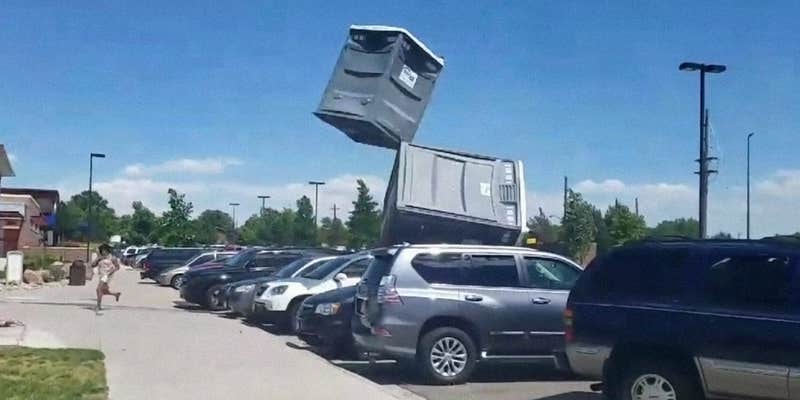 Watch These Two Portable Toilets Take Flight During a Windstorm