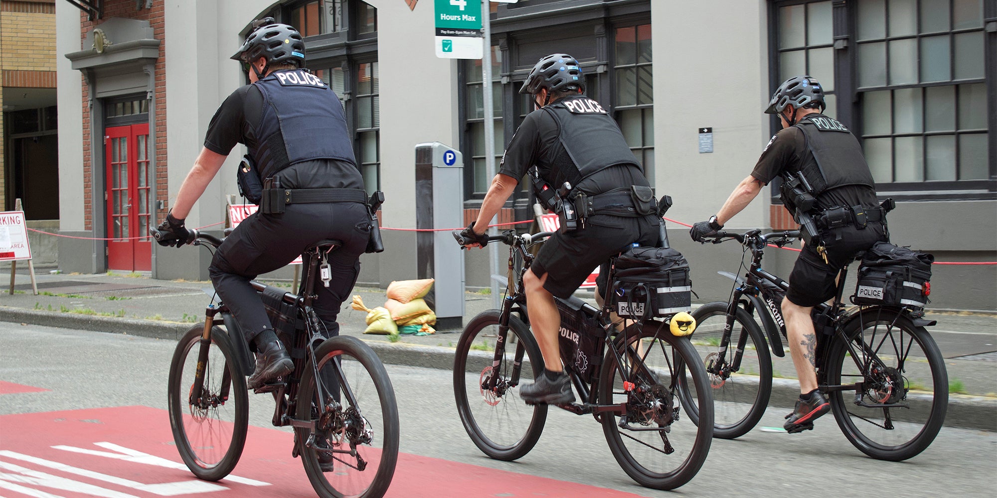 Seattle Officer Rolls Bike Over Man’s Head at Breonna Taylor Protest