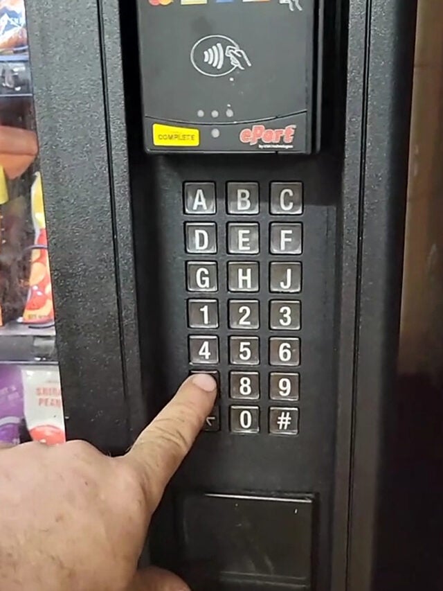 Vending machine repairman shows what combination to punch in if you’ve ...