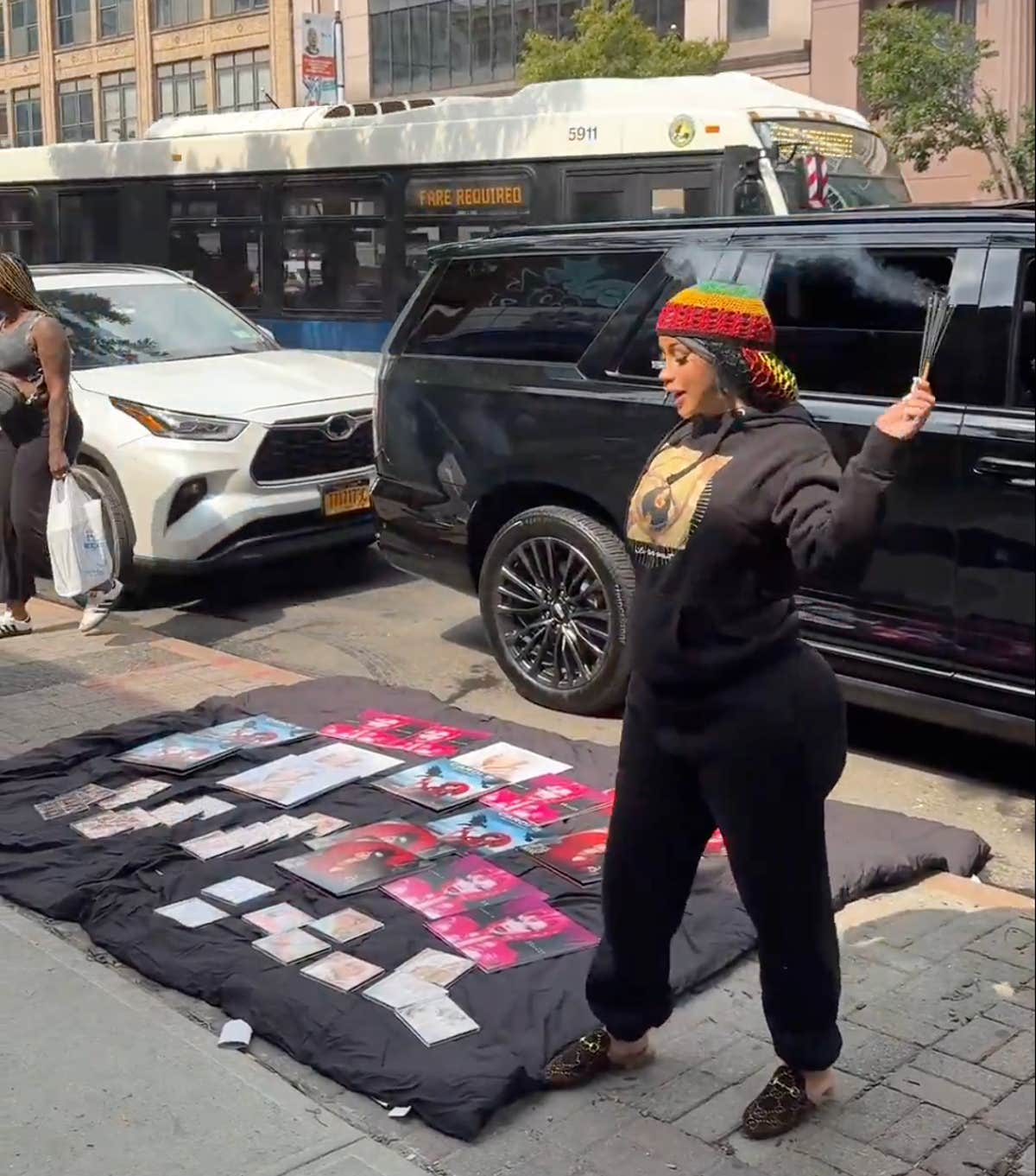 Cardi B Sells Her Album On The Street For Promotion