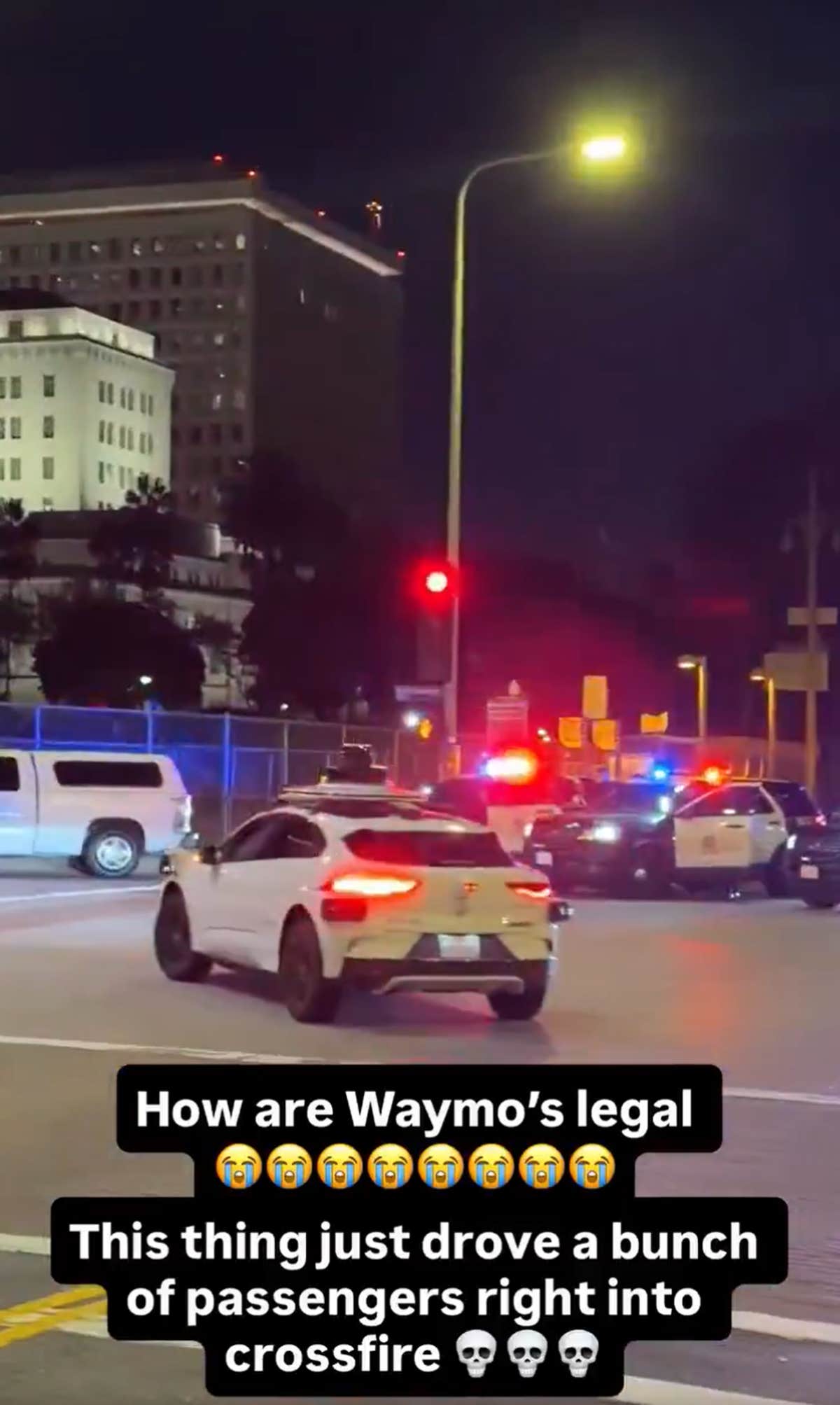 Waymo robotaxi casually drives through active LAPD standoff in viral video