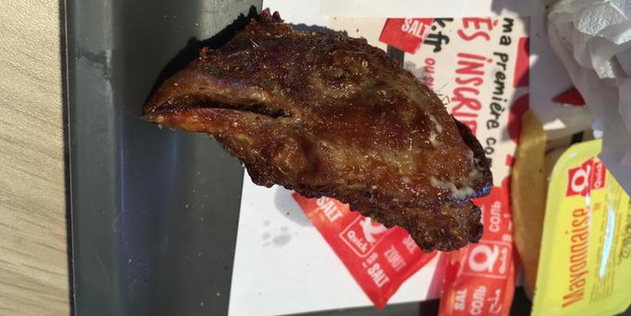 Customer Discovers Entire Battered Chicken Head In Meal
