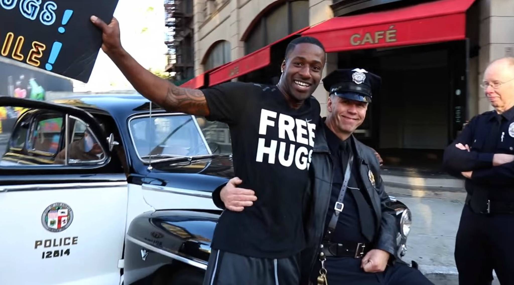 Here's a 10-minute video of people hugging Dallas police officers
