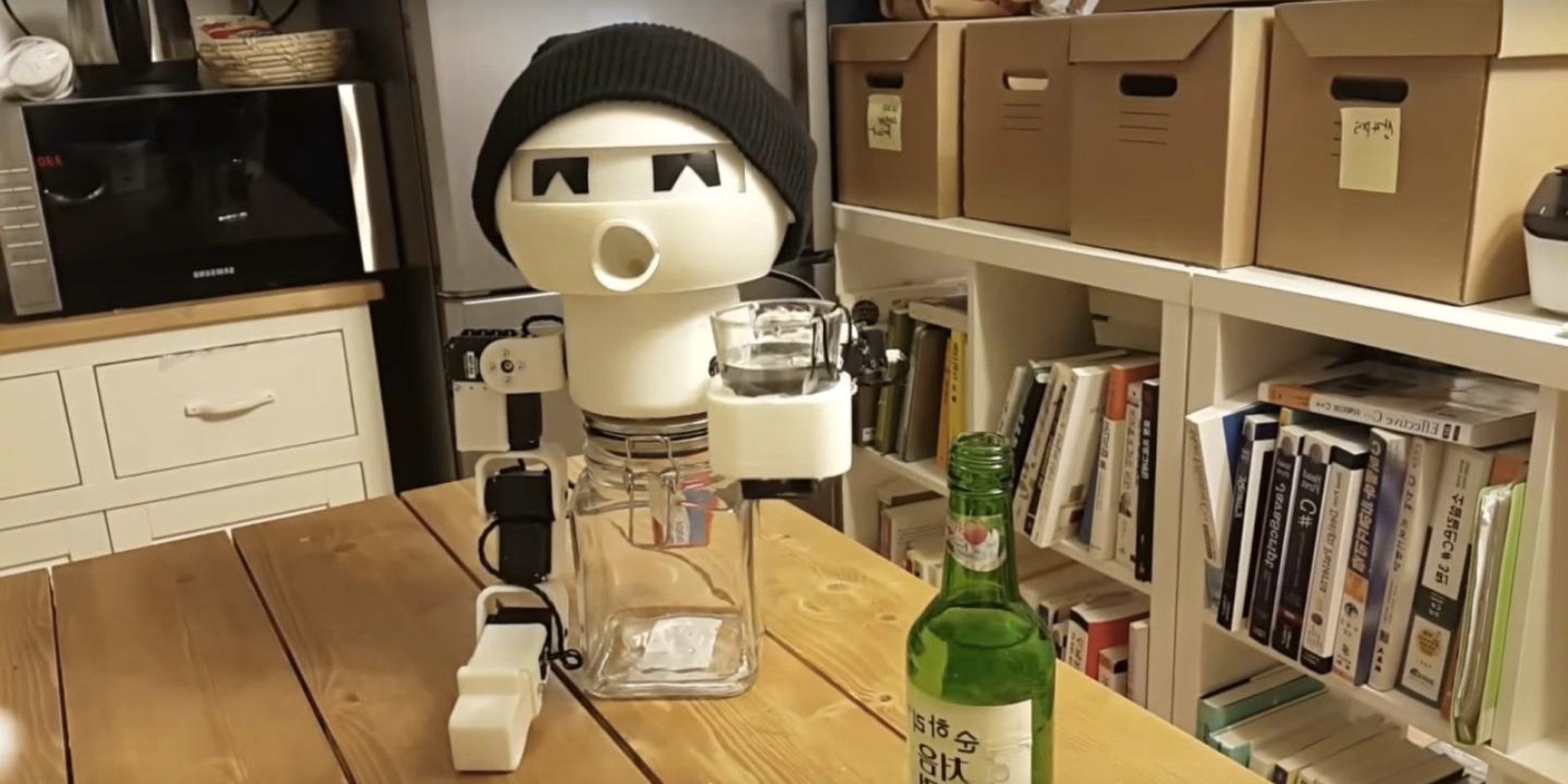 You'll always have a drinking buddy in this beer-guzzling robot