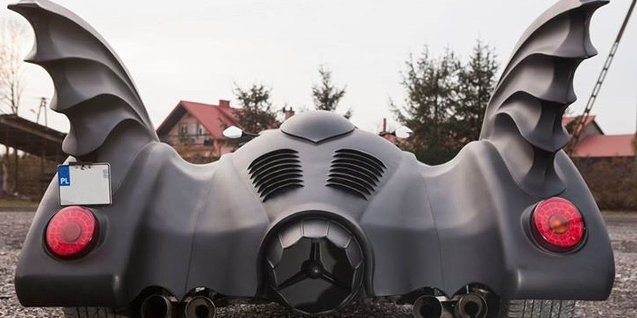 This Batcycle isn't the Batmobile, but it sure comes close