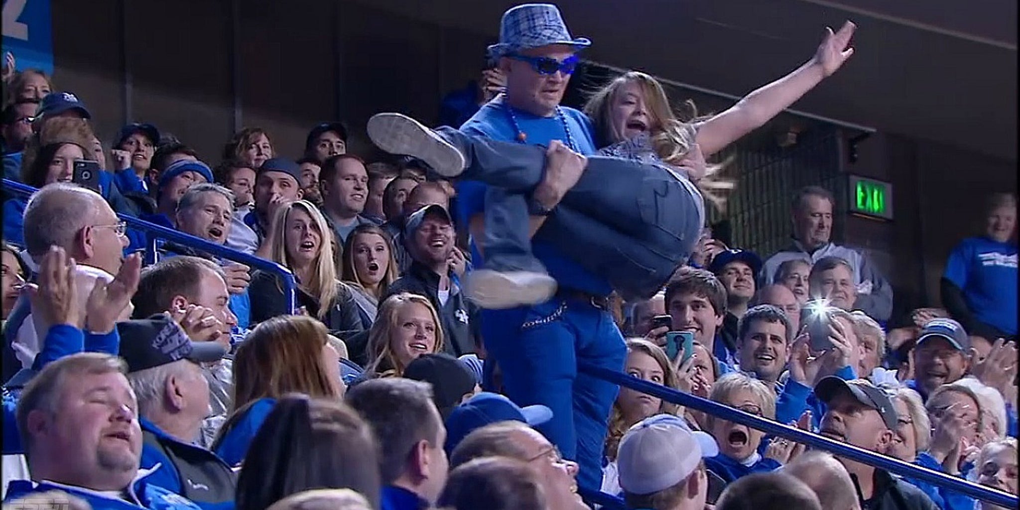 Daring, dancing Kentucky fan drops a girl while trying to showboat