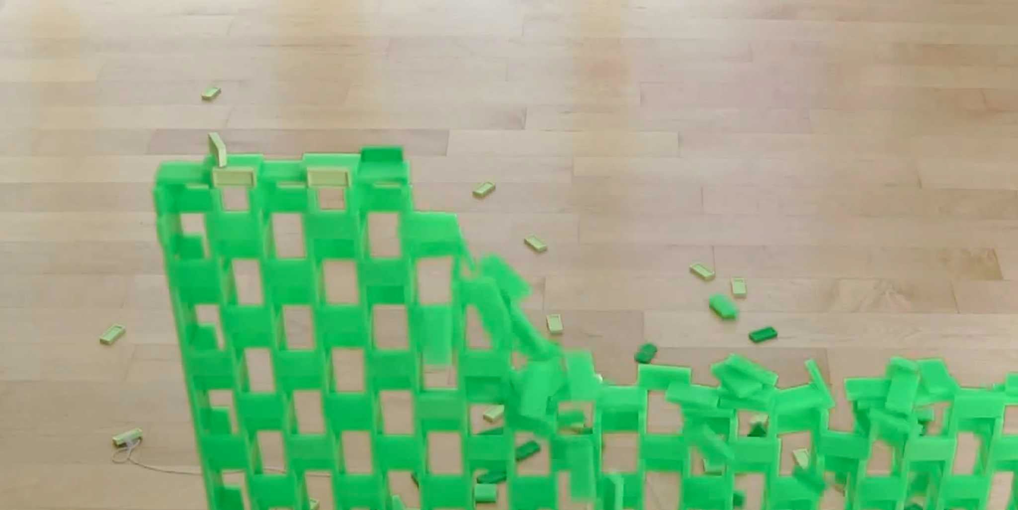 These guys spent 3 months on a domino setup—now watch them destroy it