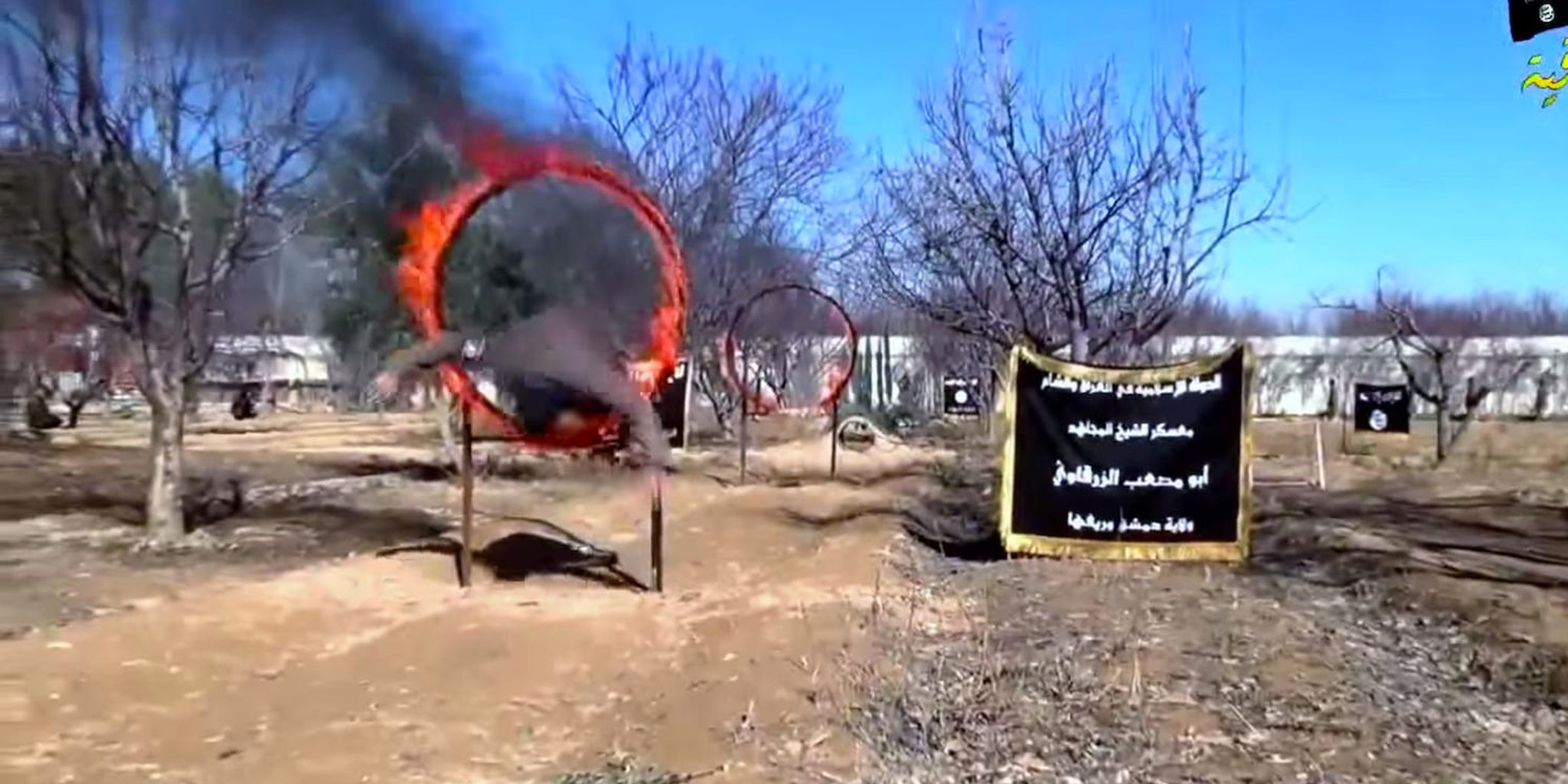 ISIS militants jump through fire hoops in YouTube training video