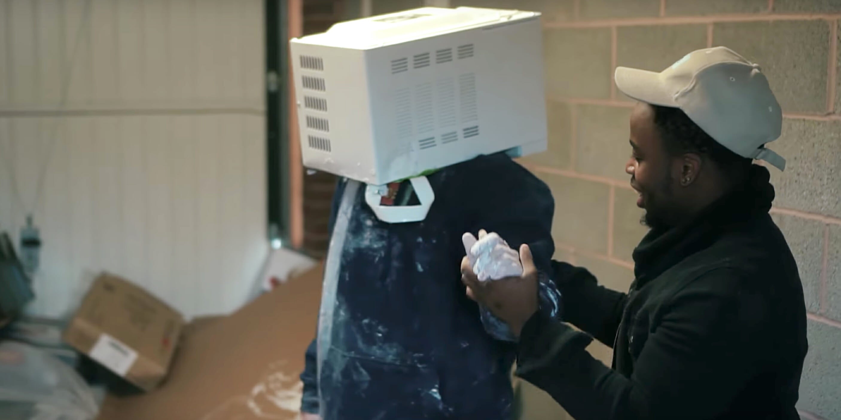 YouTube Idiot Gets His Head Stuck Inside a Microwave