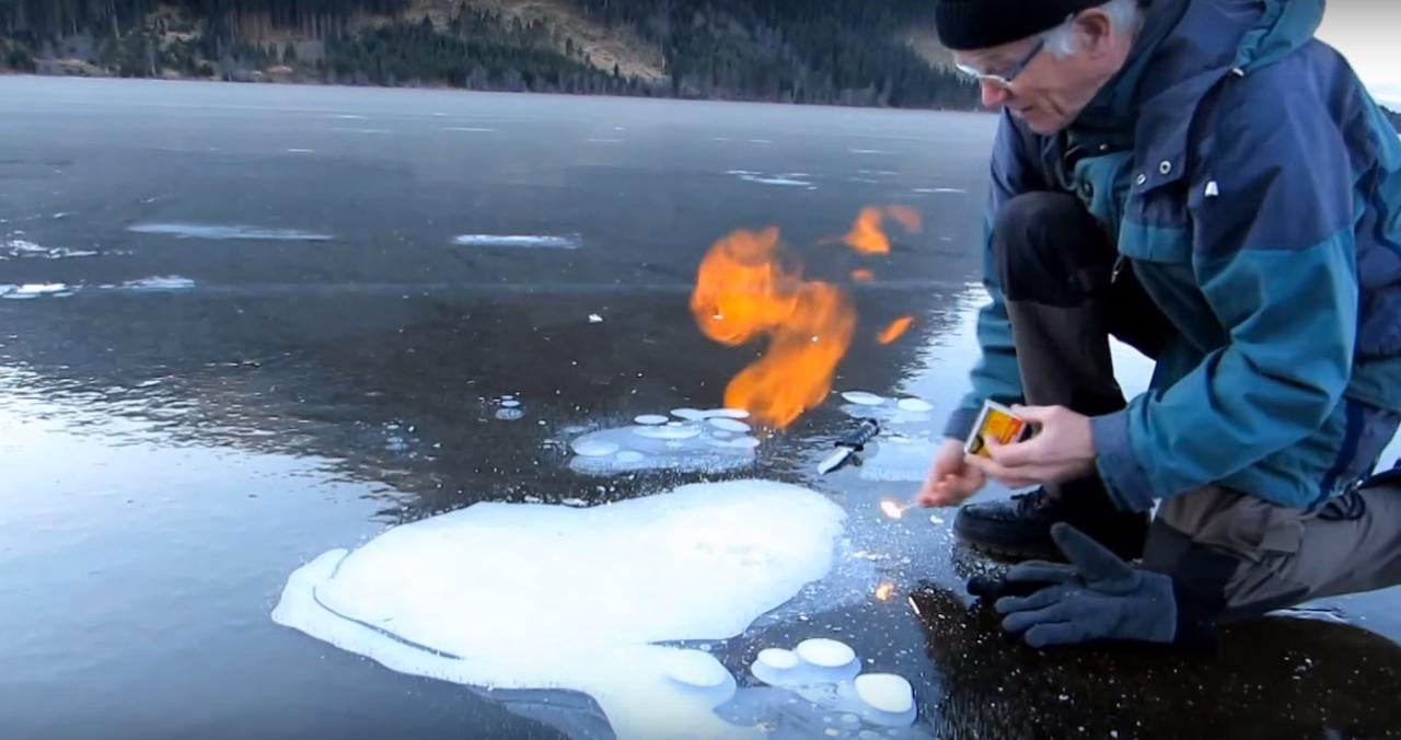 Man makes fire from frozen lake by cracking the ice