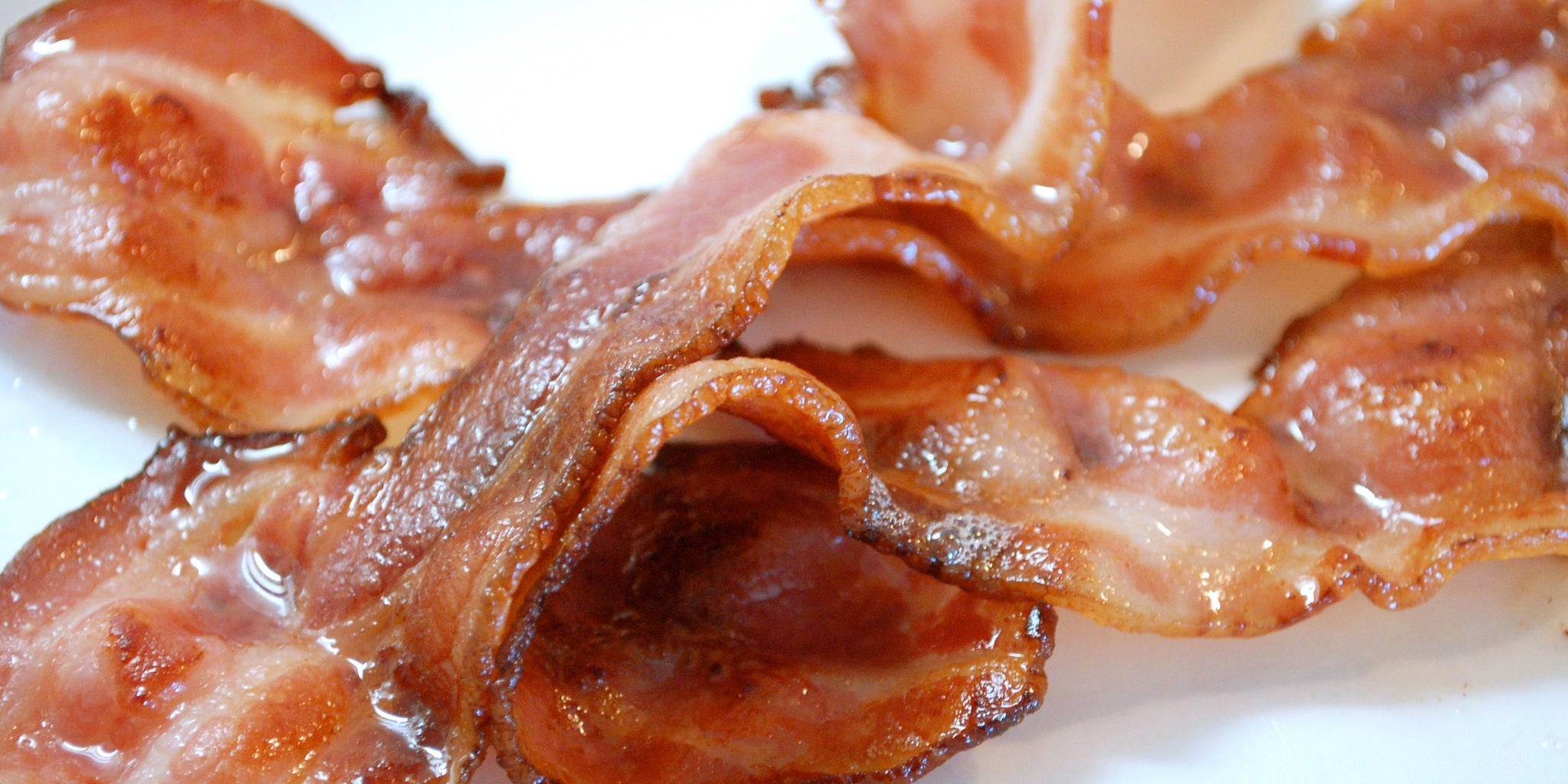 Baby has a simply magical reaction to his first taste of bacon